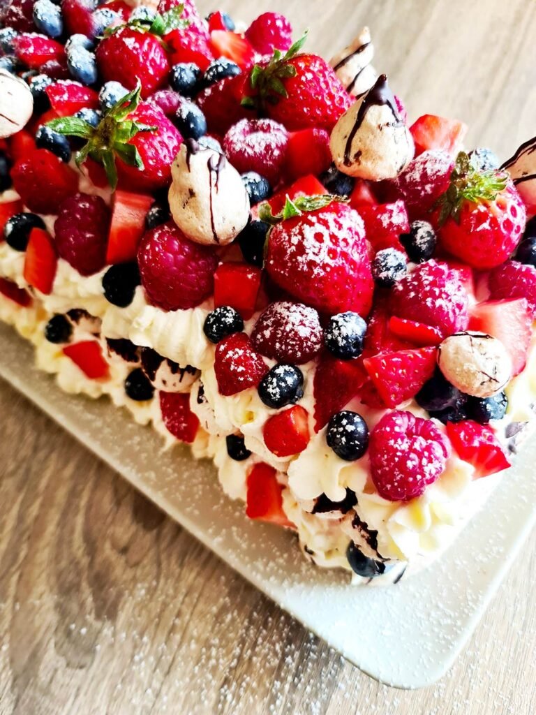 Meringue Cake with Lemon Curd Cream and Berries - Desserts